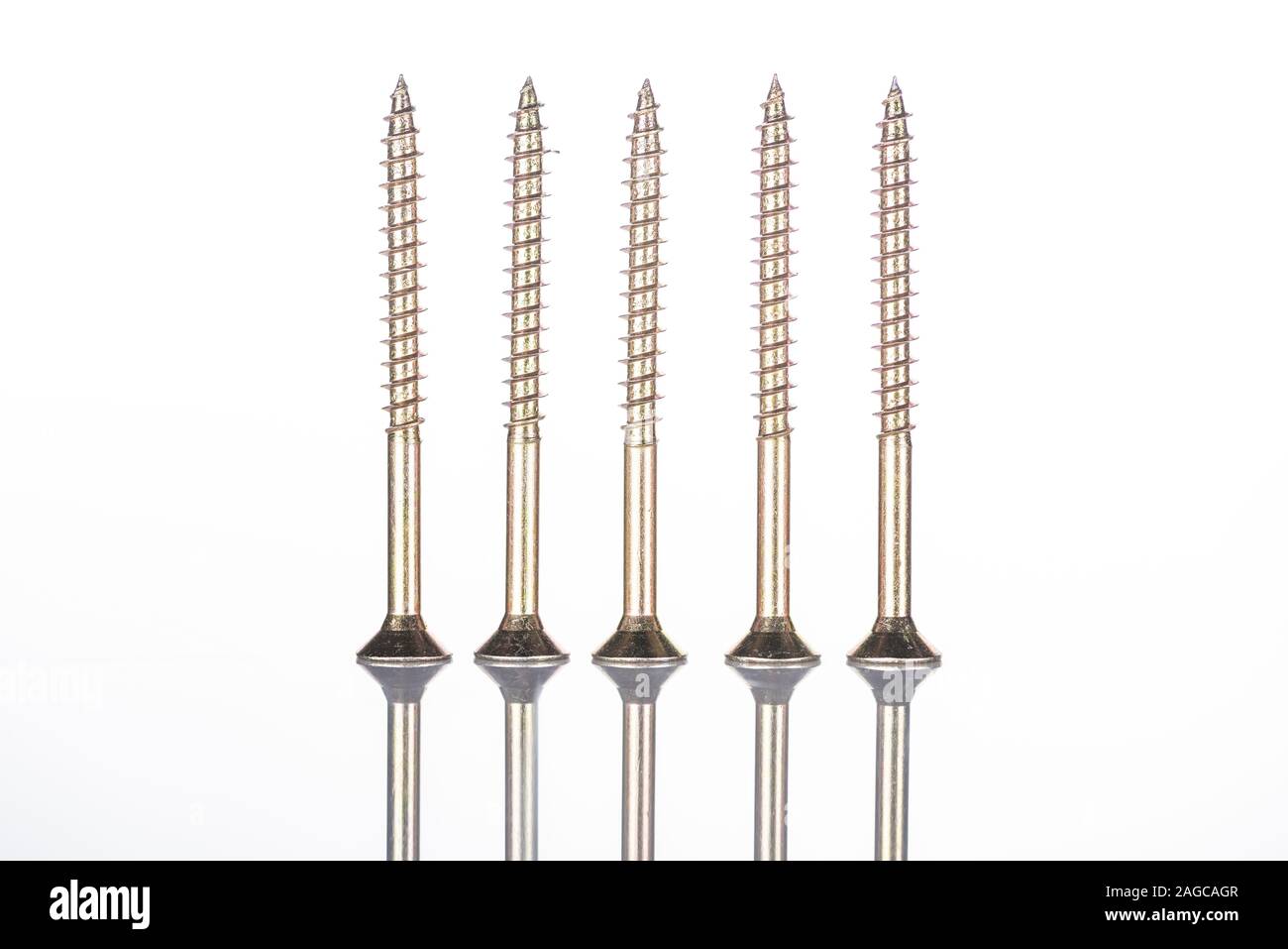shiny spotless metal studs isolated on white Stock Photo - Alamy