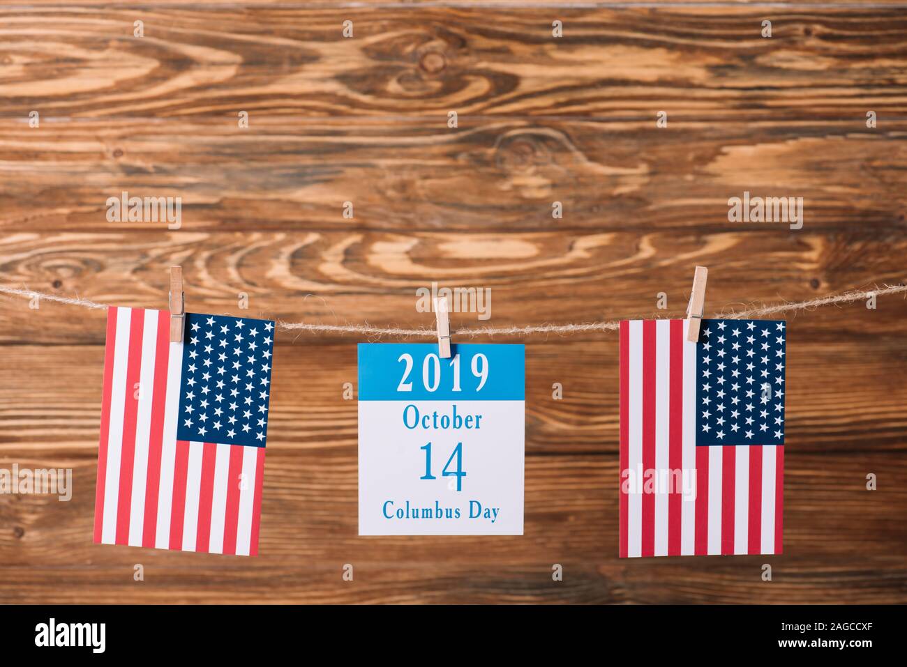 calendar with 14 October date between national flags of America on ...
