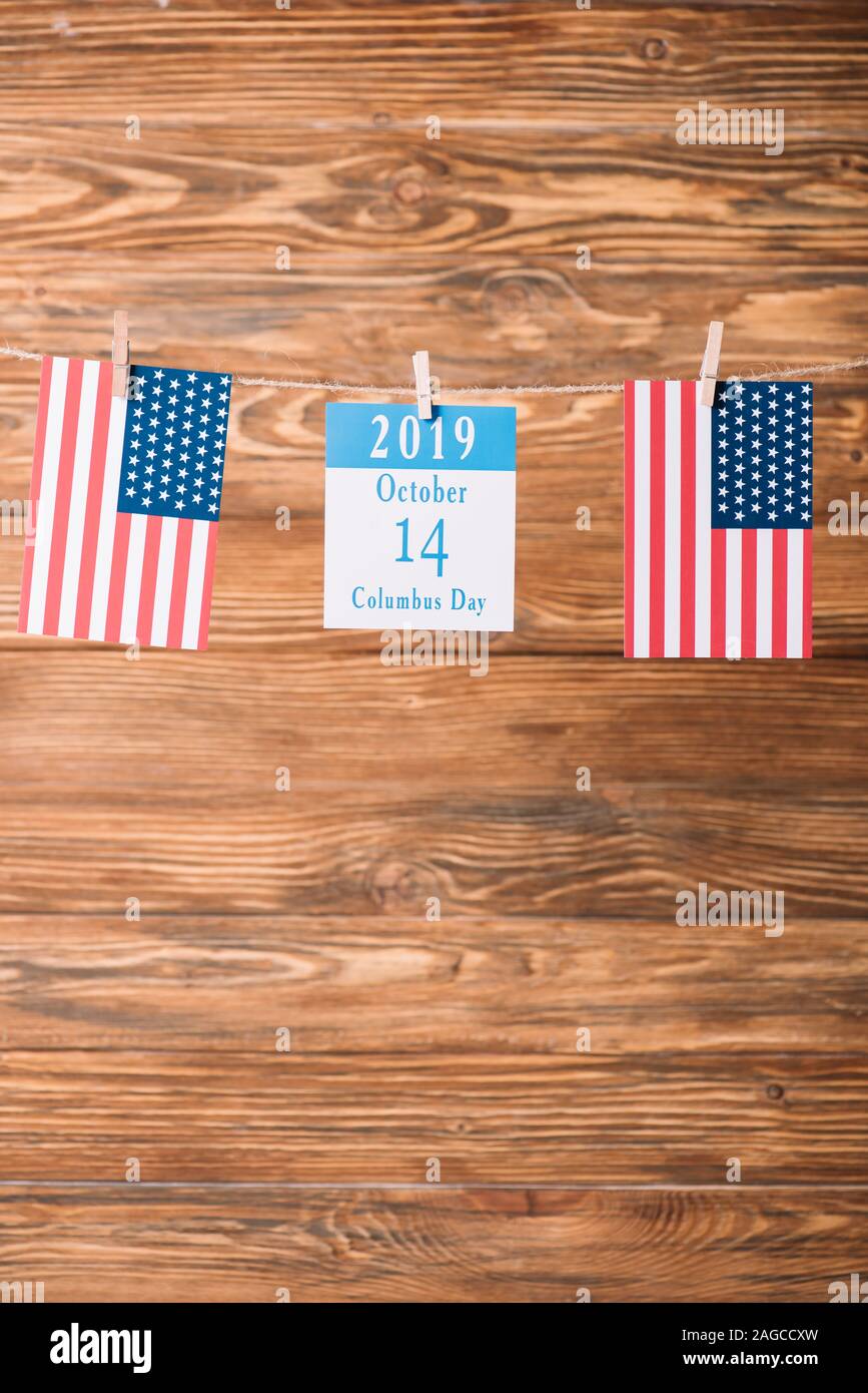 calendar paper sheet with 14 October date between American national ...