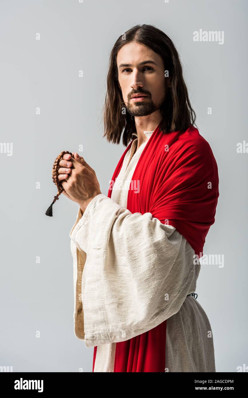 Man holding rosary beads hi-res stock photography and images - Alamy