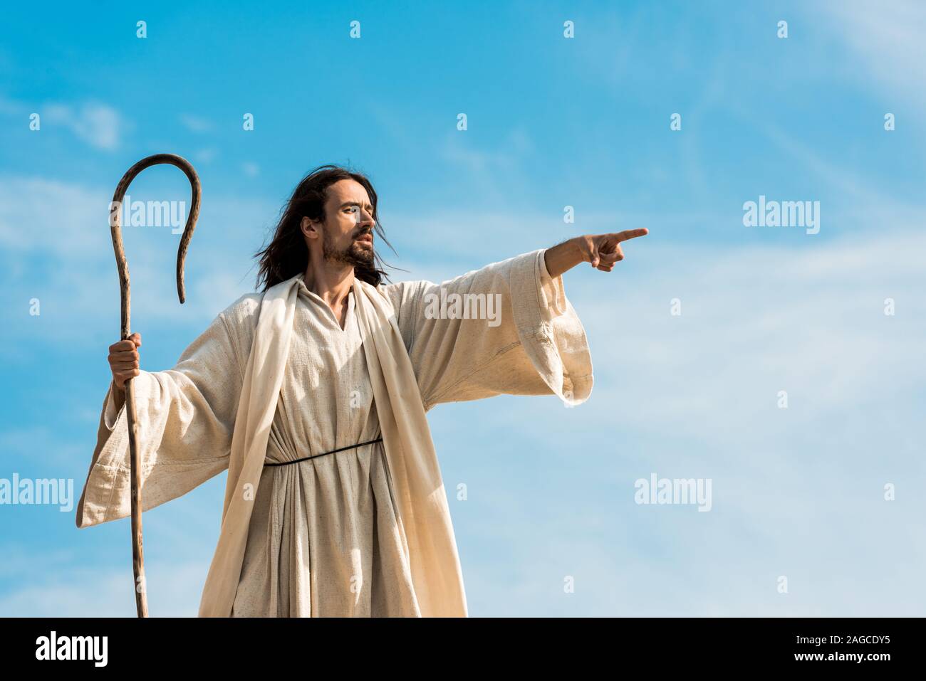 Pointing with his cane hi-res stock photography and images - Alamy