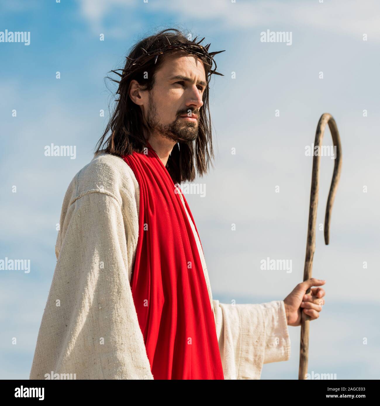 jesus in wreath holding wooden cane outside Stock Photo - Alamy