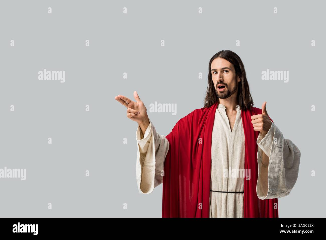 Jesus in robe showing holy hi-res stock photography and images - Alamy