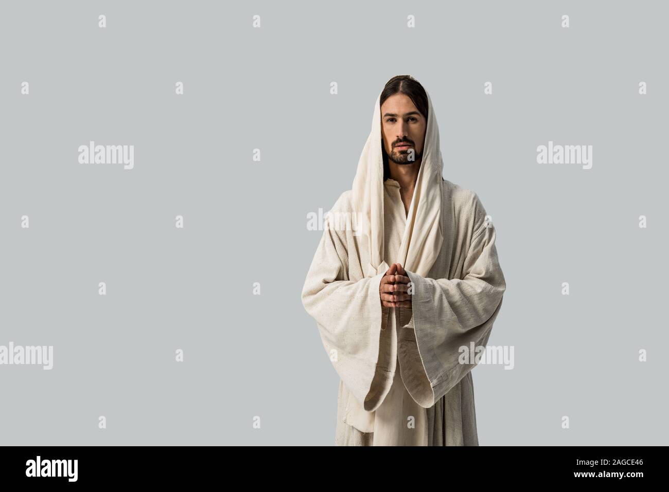 Man standing hands in prayer hi-res stock photography and images - Alamy