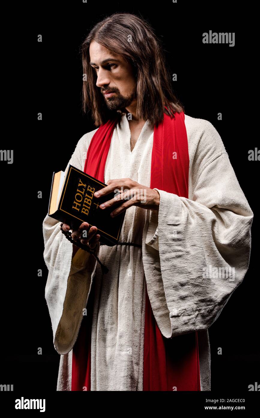 Man holding holy bible hi-res stock photography and images - Alamy