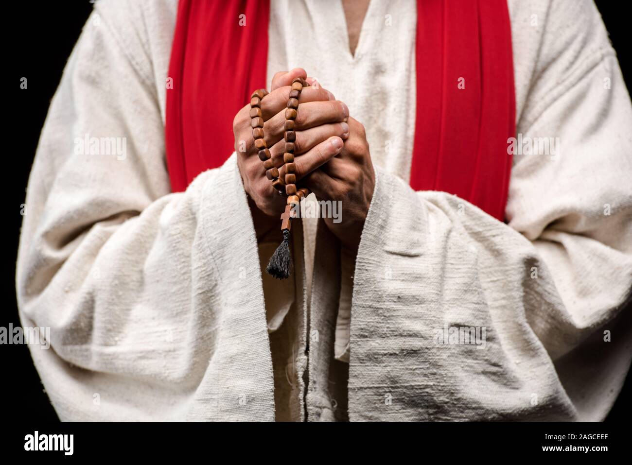 Man holding rosary beads hi-res stock photography and images - Alamy