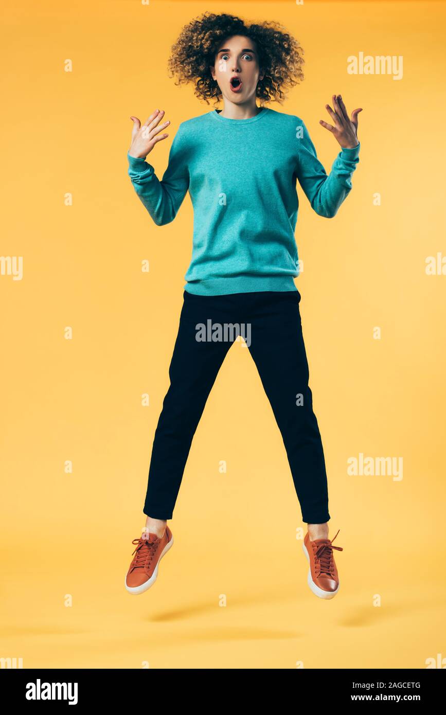Teen boy jumping hi-res stock photography and images - Alamy