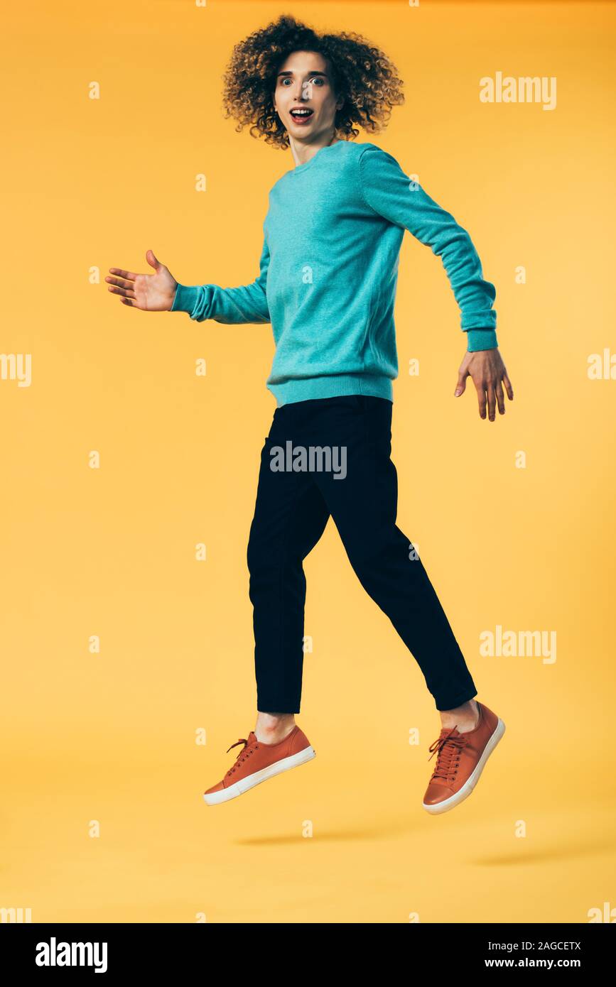 Teen boy jumping hi-res stock photography and images - Alamy