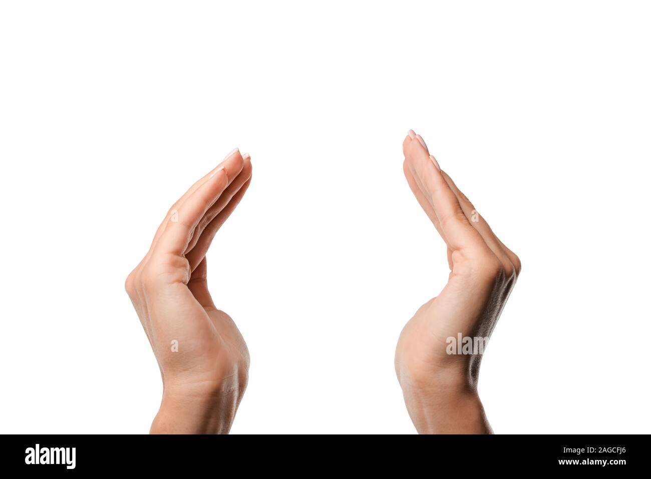 cropped view of woman showing cupped hands isolated on white Stock ...