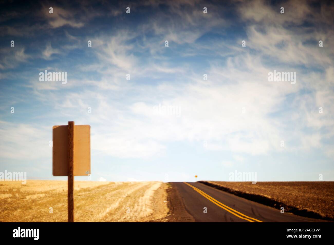 Rural Farmland and Road sign along Highway Stock Photo - Alamy