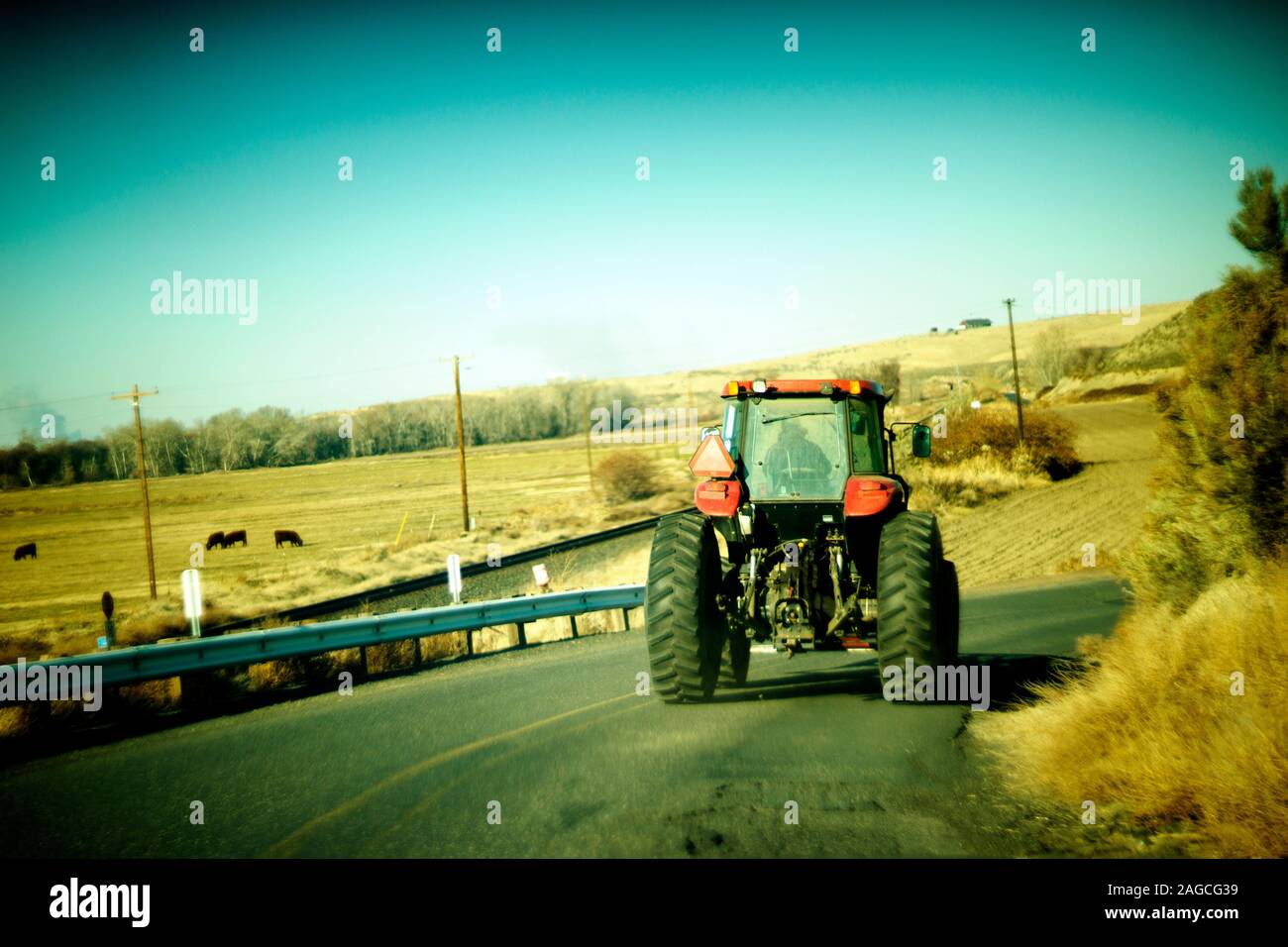 Tractor on rural road hi-res stock photography and images - Alamy