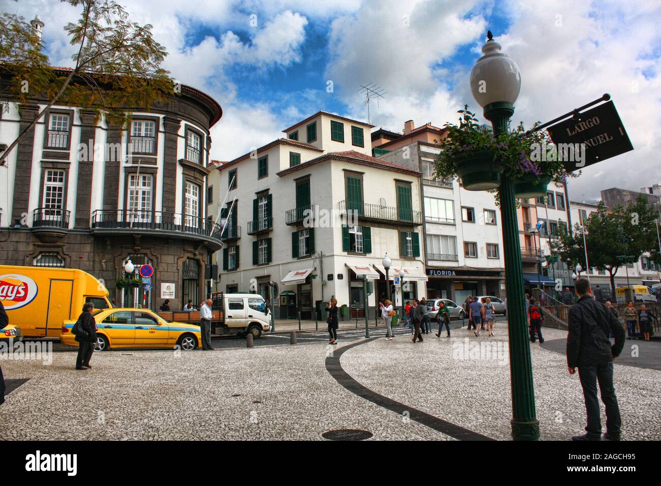 ILHA DA MADEIRA, PORTUGAL - May 20, 2019: People and cars in a public ...