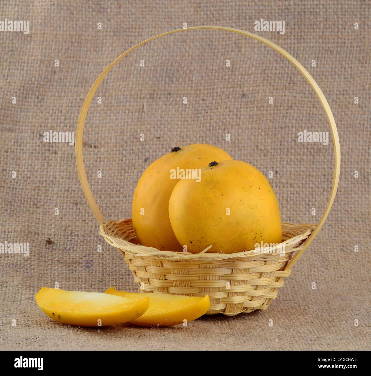 Mango in bamboo basket hi-res stock photography and images - Alamy