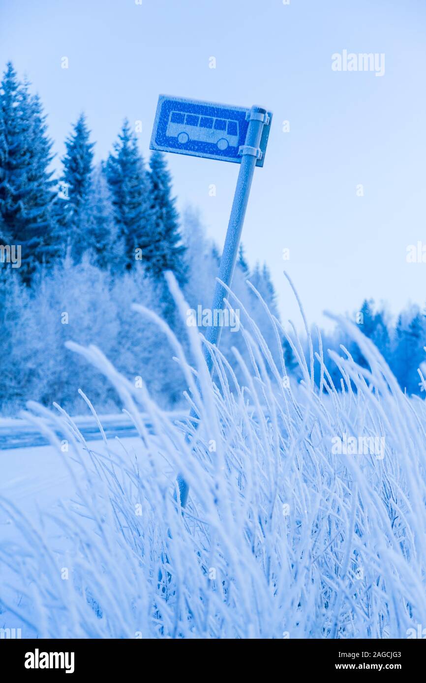 Bus stop sign in the winter Stock Photo - Alamy