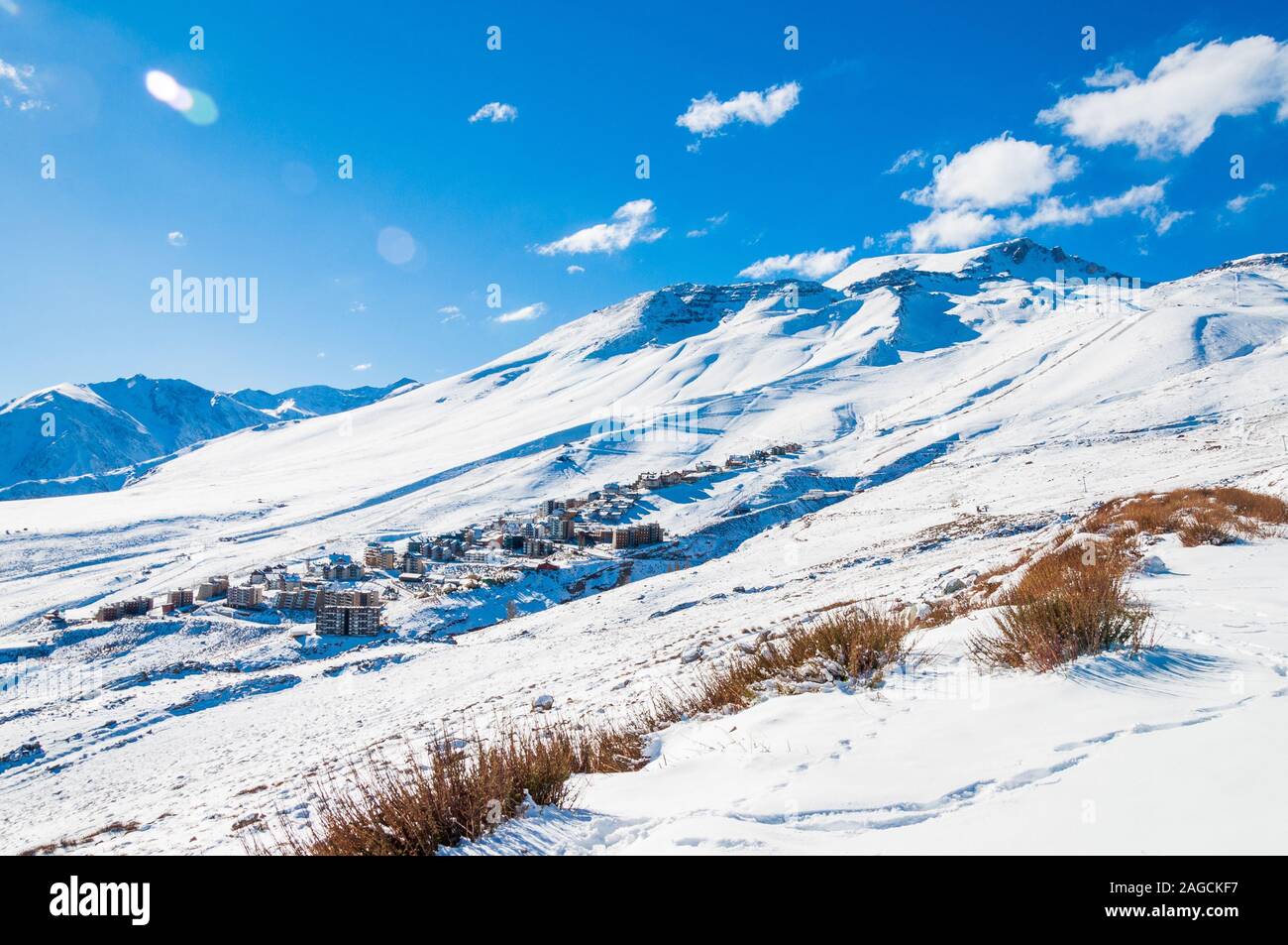 Beautiful low angle shot of a breathtaking mountainous scenery covered ...