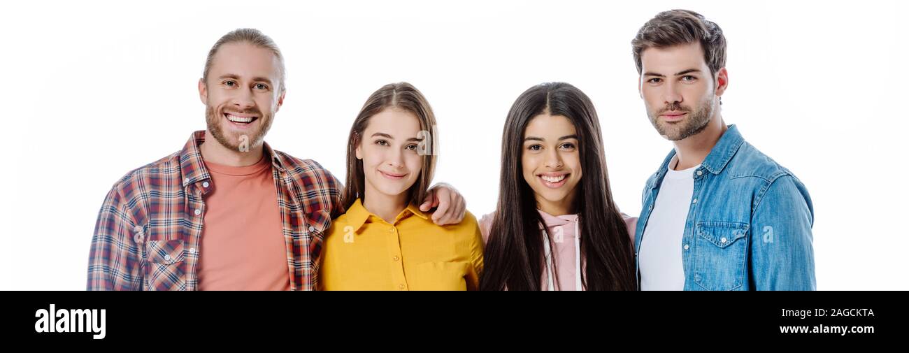 happy multicultural friends embracing isolated on white, panoramic shot ...