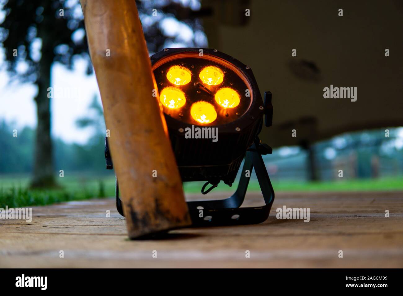Image of orange LED light on wooden ground Stock Photo - Alamy
