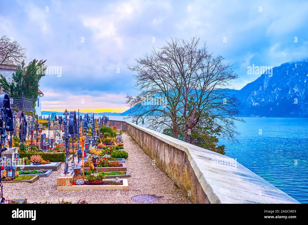 TRAUNKIRCHEN, AUSTRIA - FEBRUARY 22, 2019: The small cemetery is ...