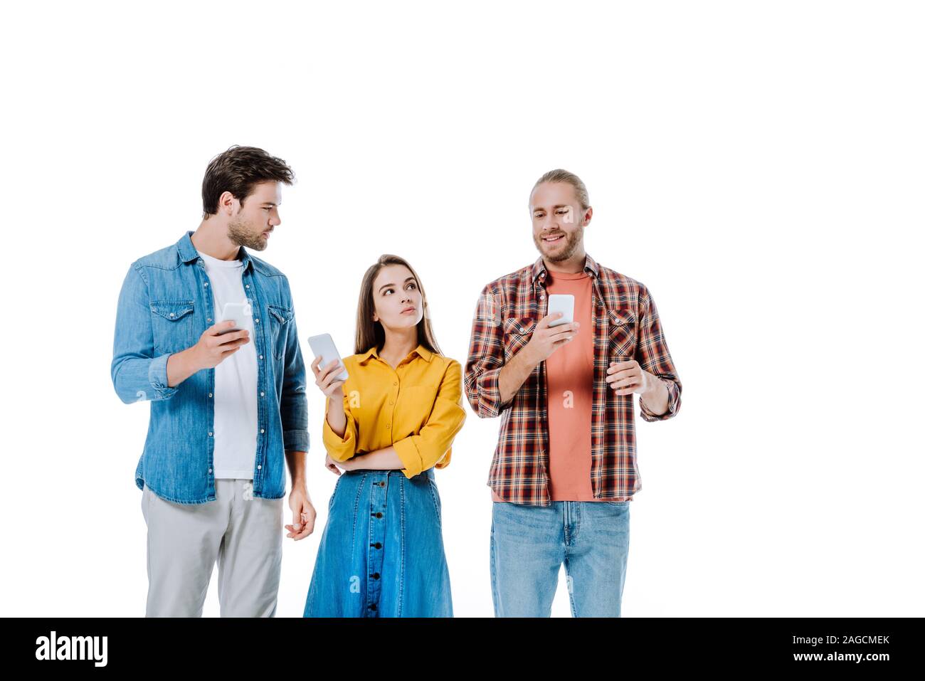 three young friends using smartphones isolated on white Stock Photo - Alamy