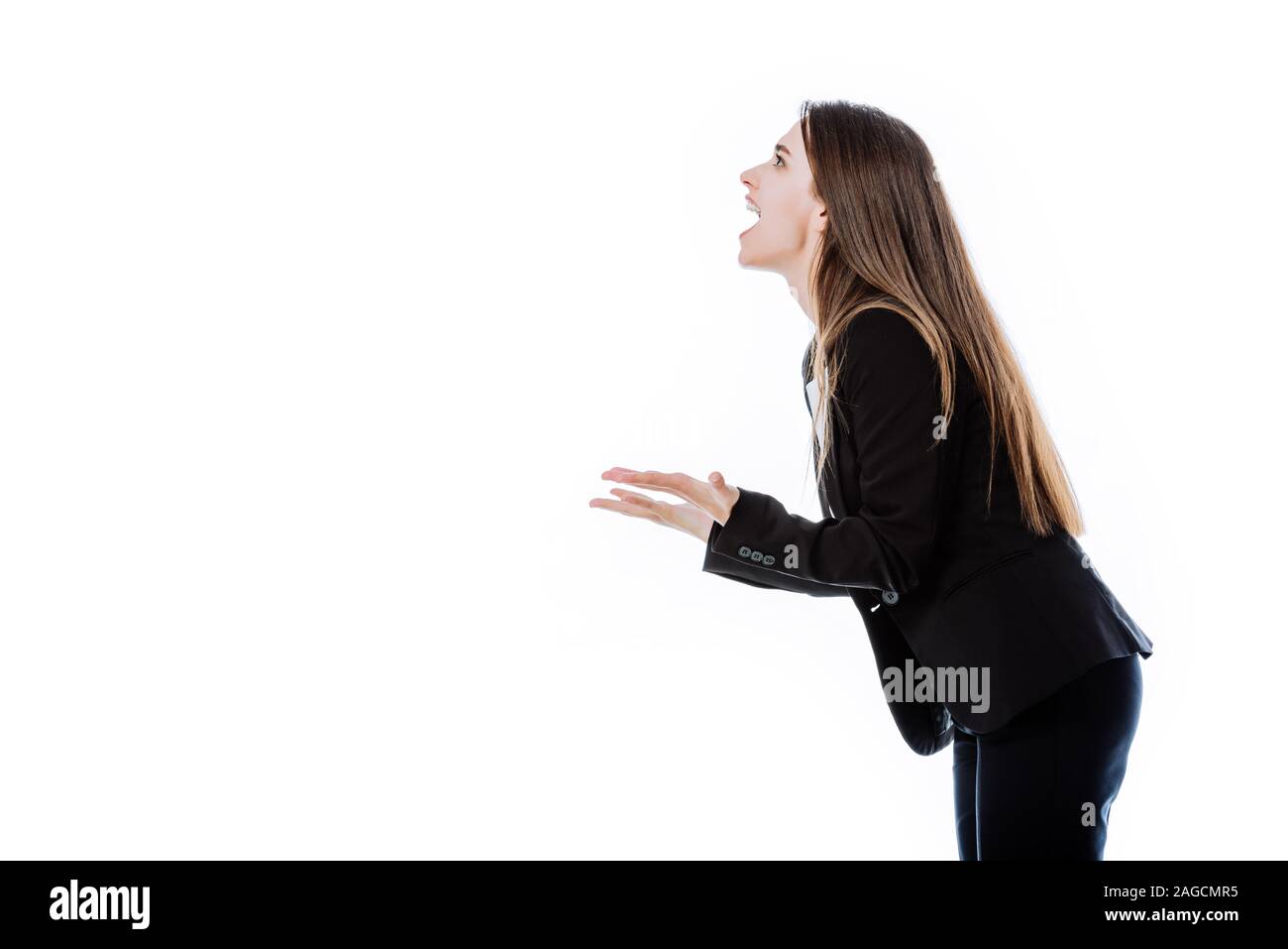 side view of angry businesswoman in suit screaming isolated on white ...