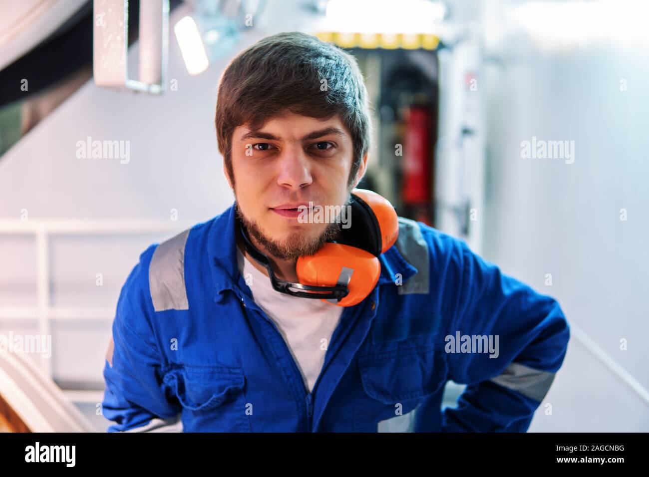 Marine engineer works on the ship. Seamen's work Stock Photo - Alamy