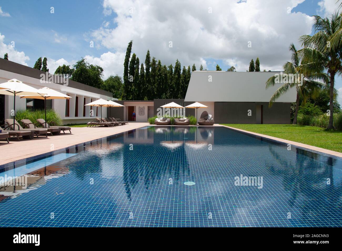 Beautiful scenery of the pool surroundings reflecting in the water in ...