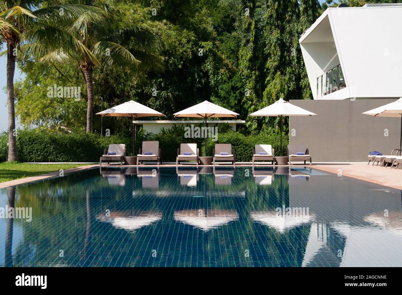 Beautiful scenery of the pool surroundings reflecting in the water in ...