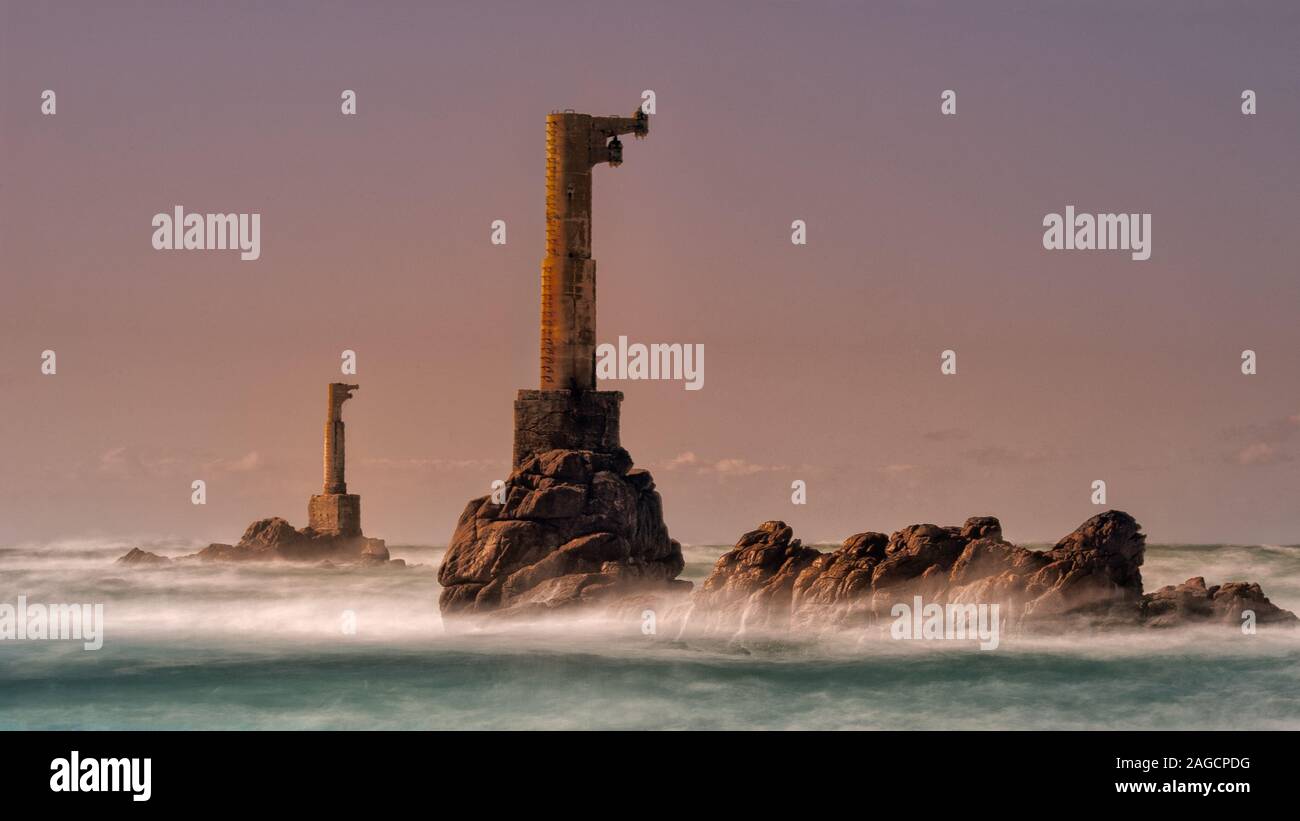 Ancient electric cable support in the ocean Stock Photo - Alamy