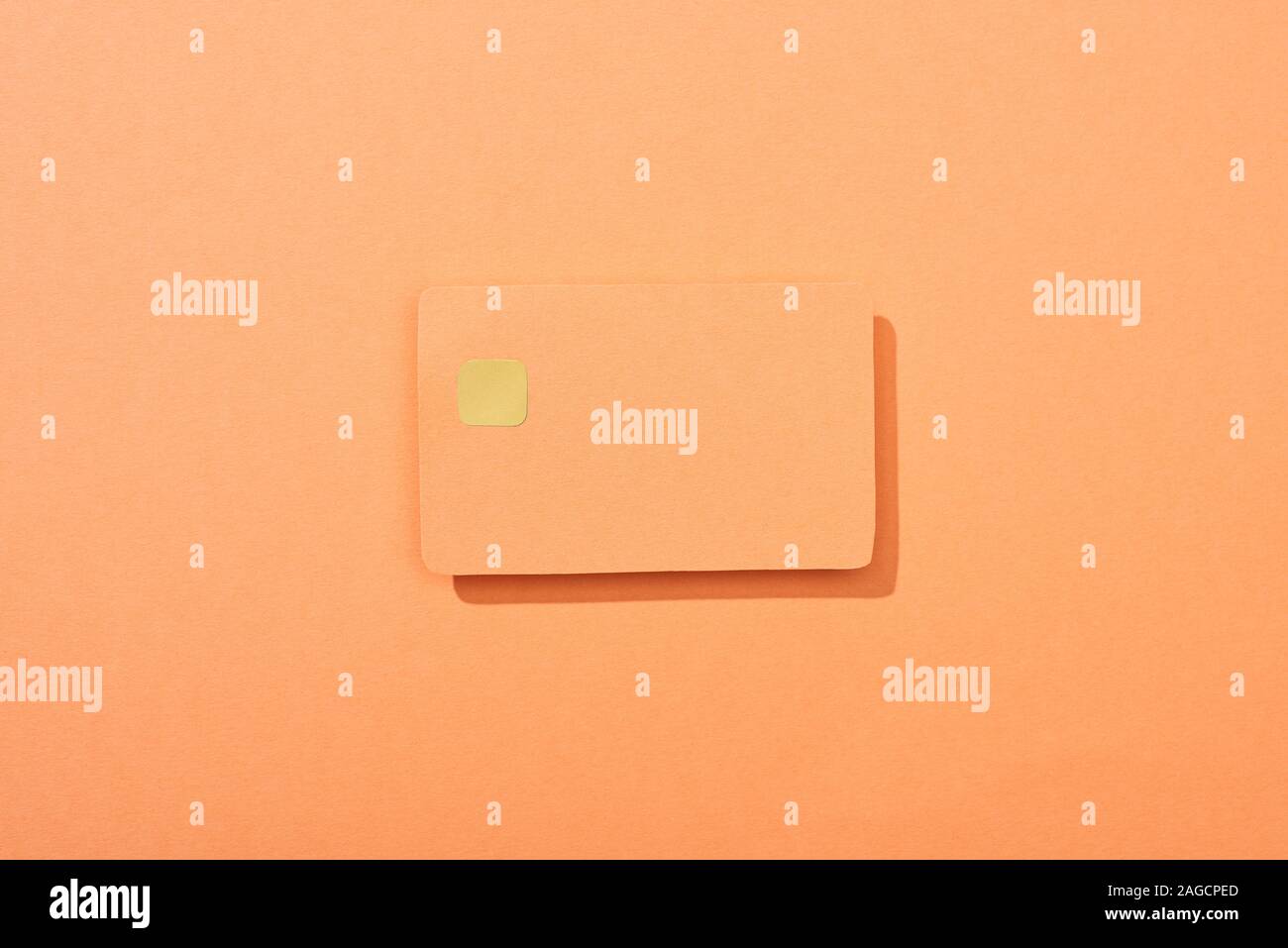 top view of colorful empty credit card on peach background Stock Photo ...
