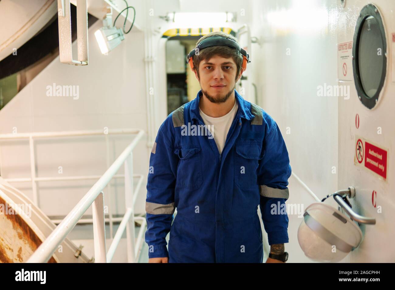 Marine engineer works on the ship. Seamen's work Stock Photo - Alamy