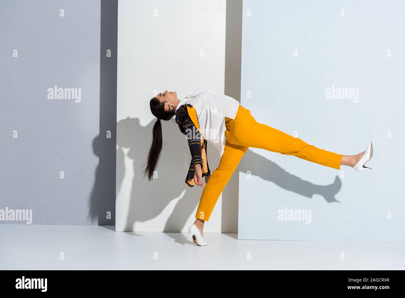 Side profile girl posing standing hi-res stock photography and images ...