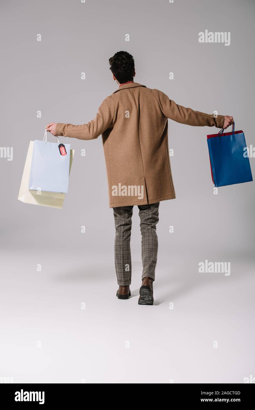 Back view handsome man shopping hi-res stock photography and images - Alamy