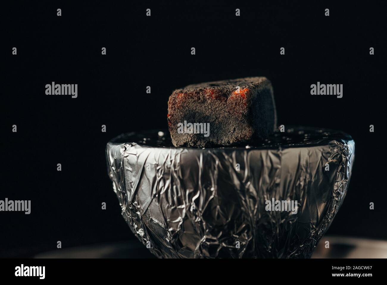 hookah bowl with hot coal isolated on black Stock Photo - Alamy