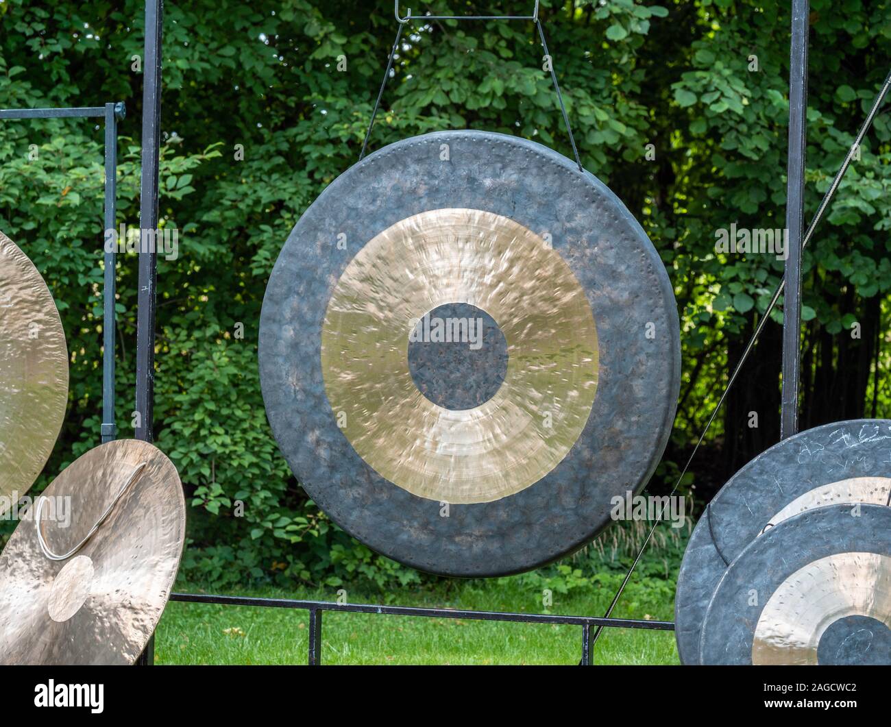 Close up view of Gong texture background. Abstract black and golden ...