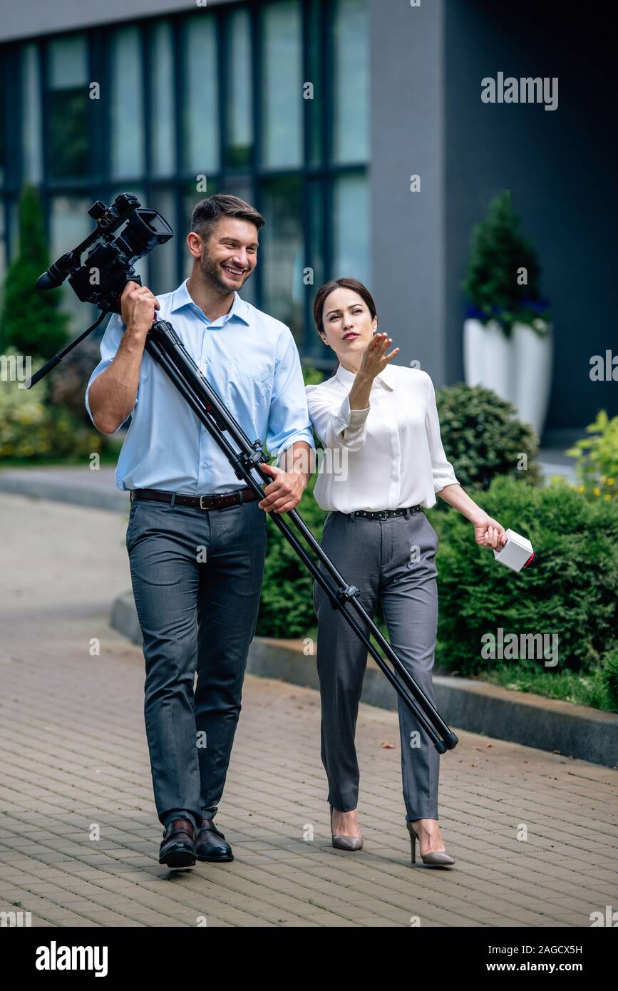 Hand cameraman holding video camera hi-res stock photography and images ...