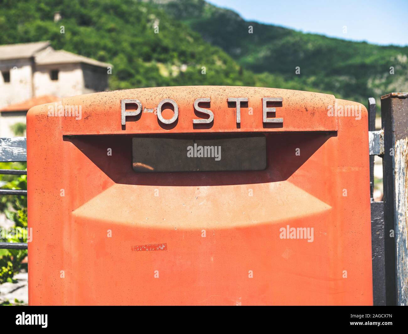 italian red mailbox where to mail letters and postcards Stock Photo - Alamy