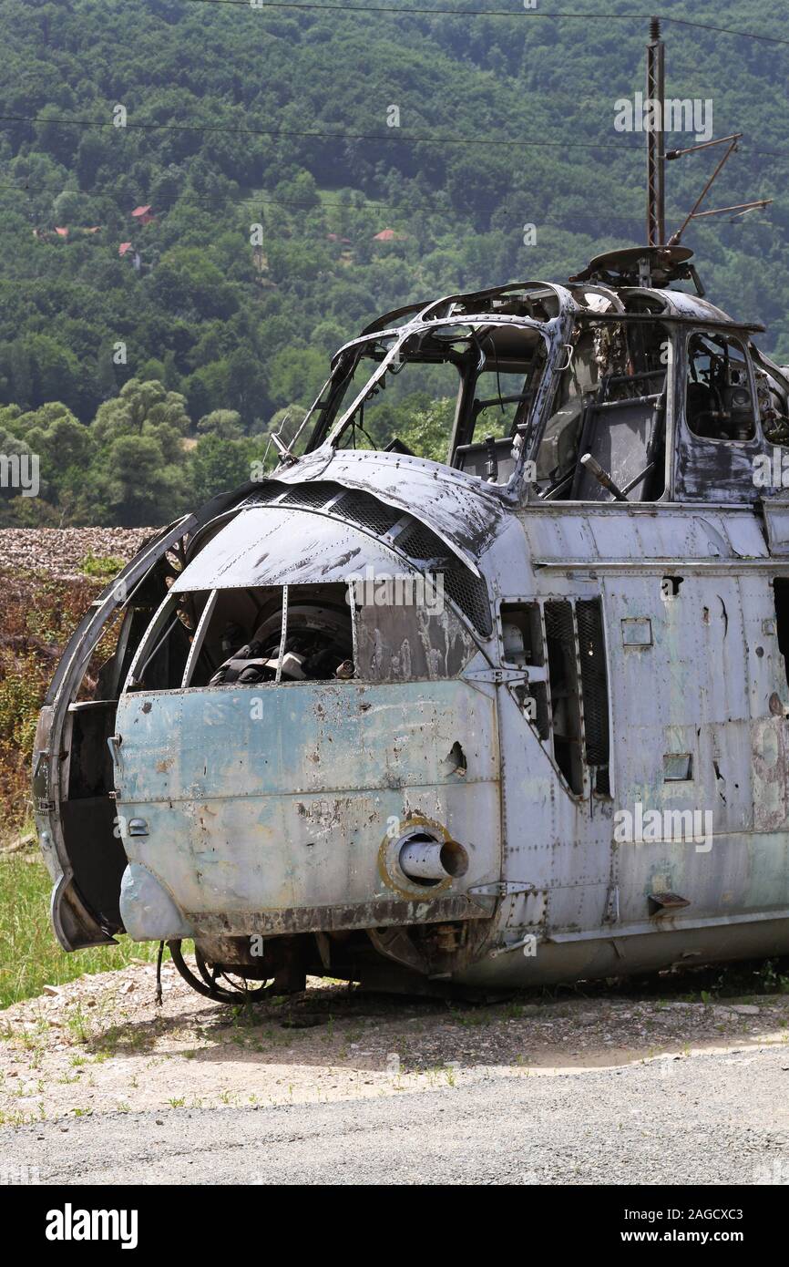 Damged crashed helicopter after fire in cabin Stock Photo - Alamy