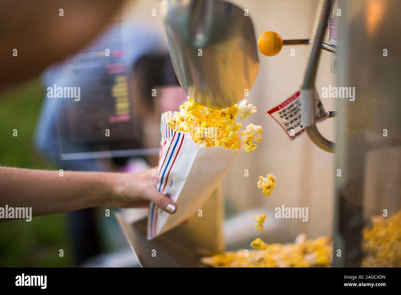 Hand popcorn cutout hi-res stock photography and images - Alamy