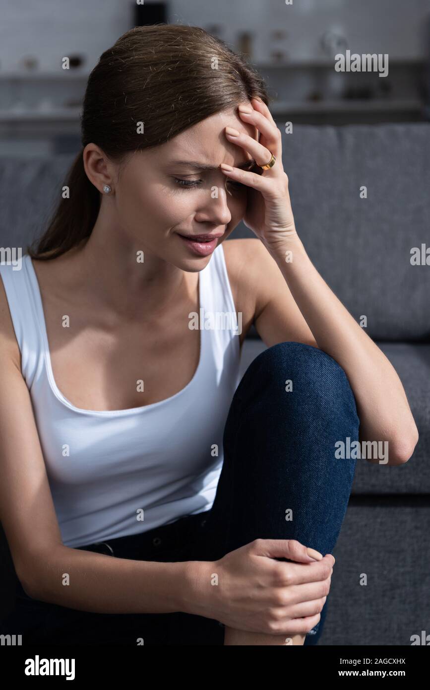 depressed young woman with ring crying at home Stock Photo - Alamy