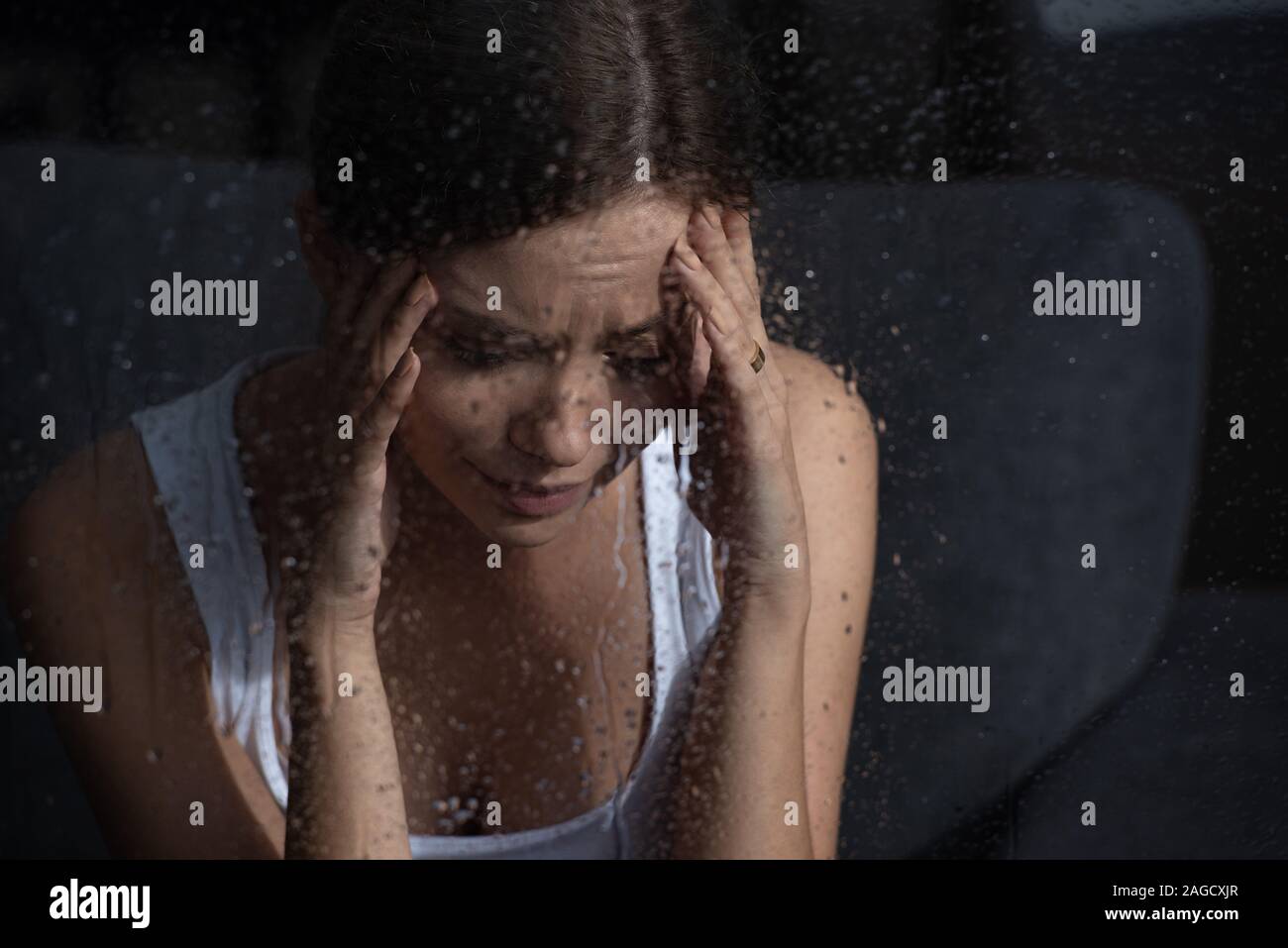 selective focus of stressed young woman crying at home Stock Photo - Alamy