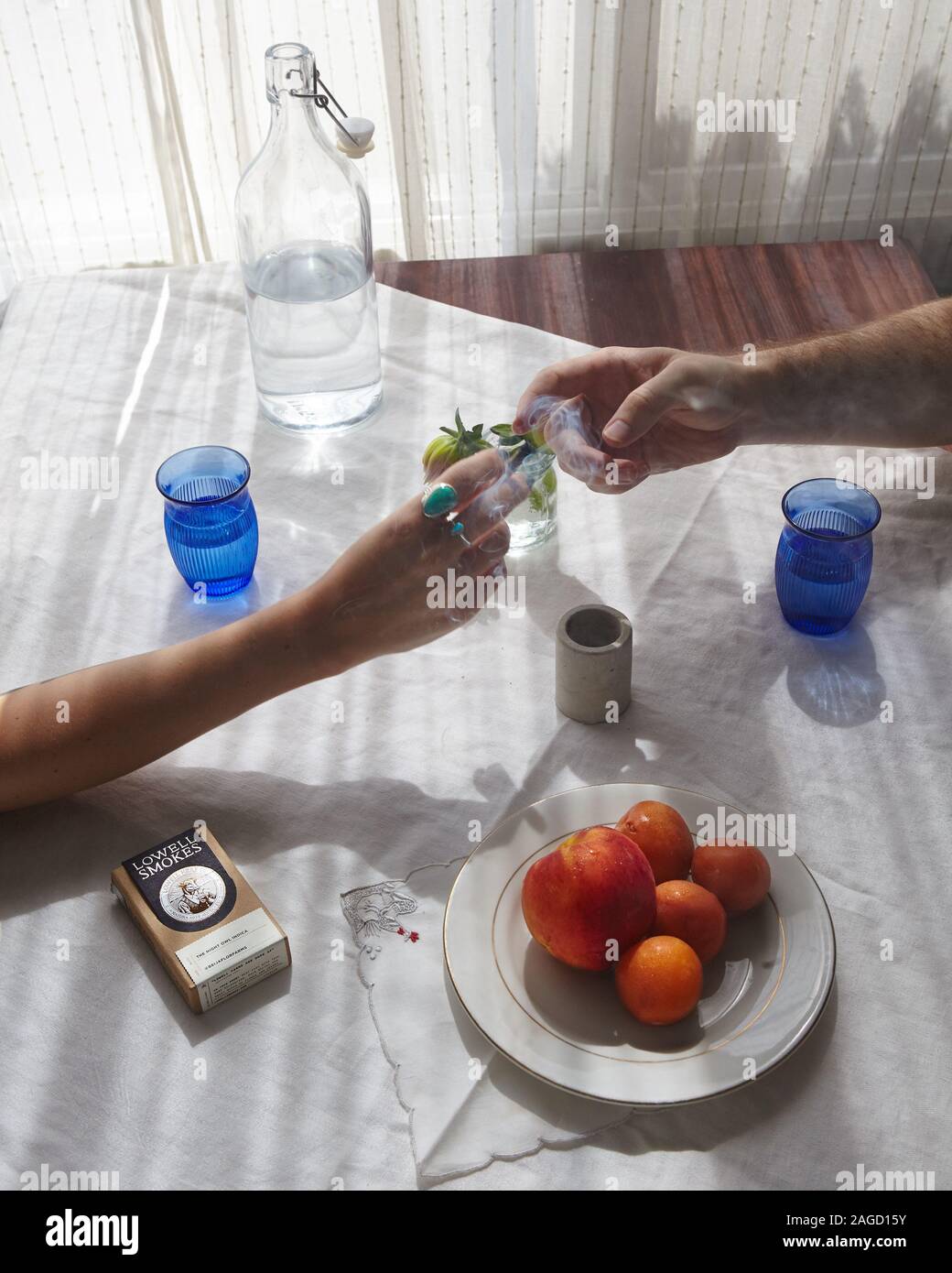 Los Angeles United States Jul 07 2017 Womans Hand Passing Joint To Mans Hand With Smoke