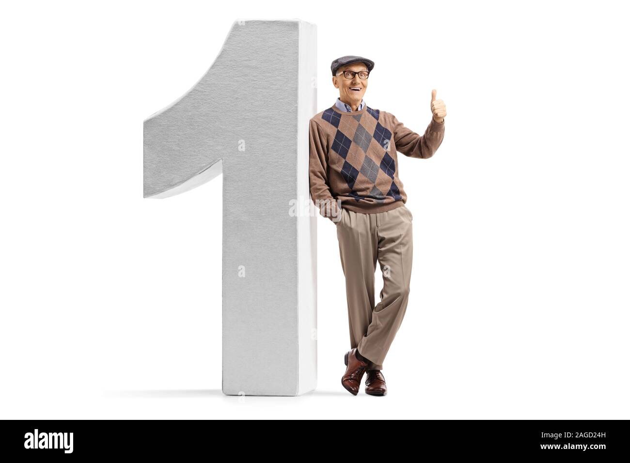 Full length portrait of an elderly gentleman leaning on a big number ...