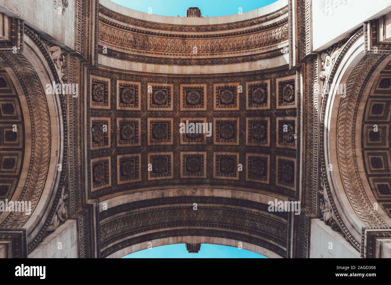 Low shot of a ceiling of the Arc of Triumph in Paris with beautiful ...