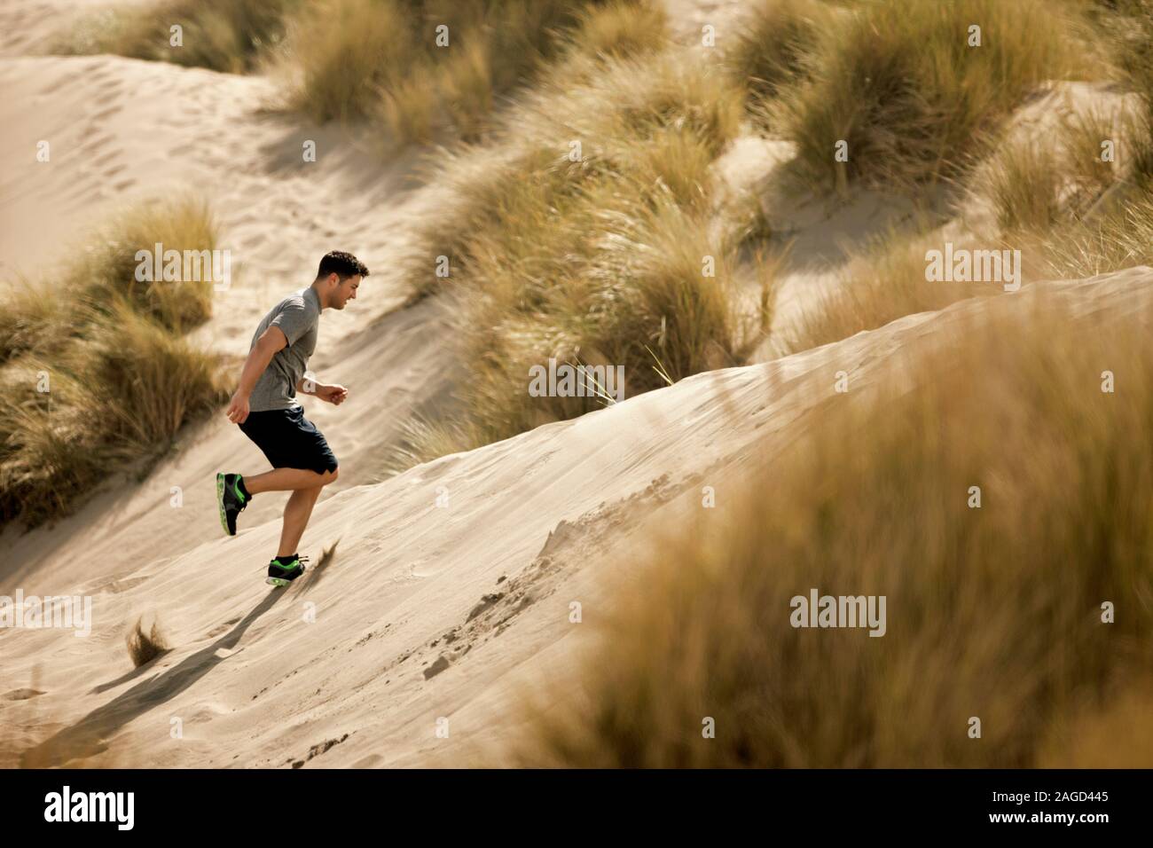 Trainers running sand hi-res stock photography and images - Alamy