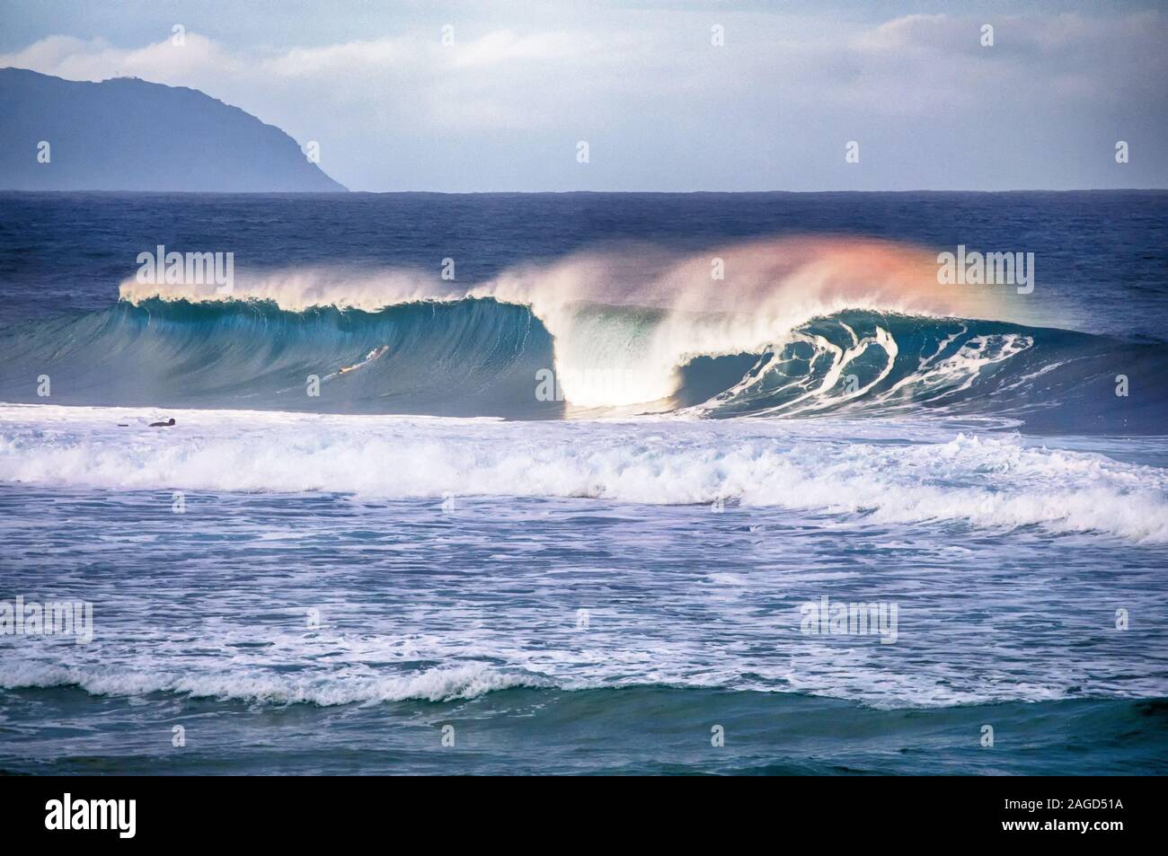 Breathtaking shot of ocean waves splashing to each other creating the ...