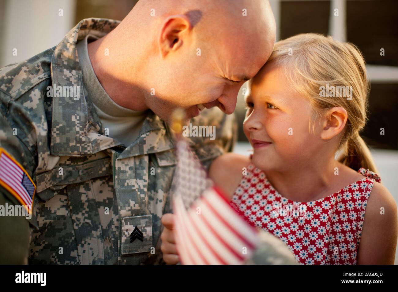 Happy army soldier with his young daughter Stock Photo - Alamy