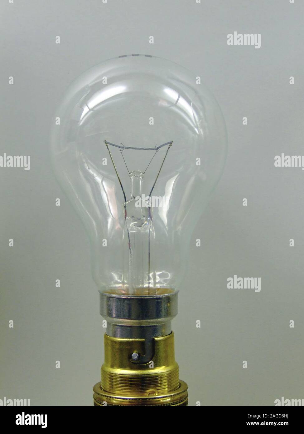 Turned off incandescent light bulb with bayonet fixture Stock Photo - Alamy