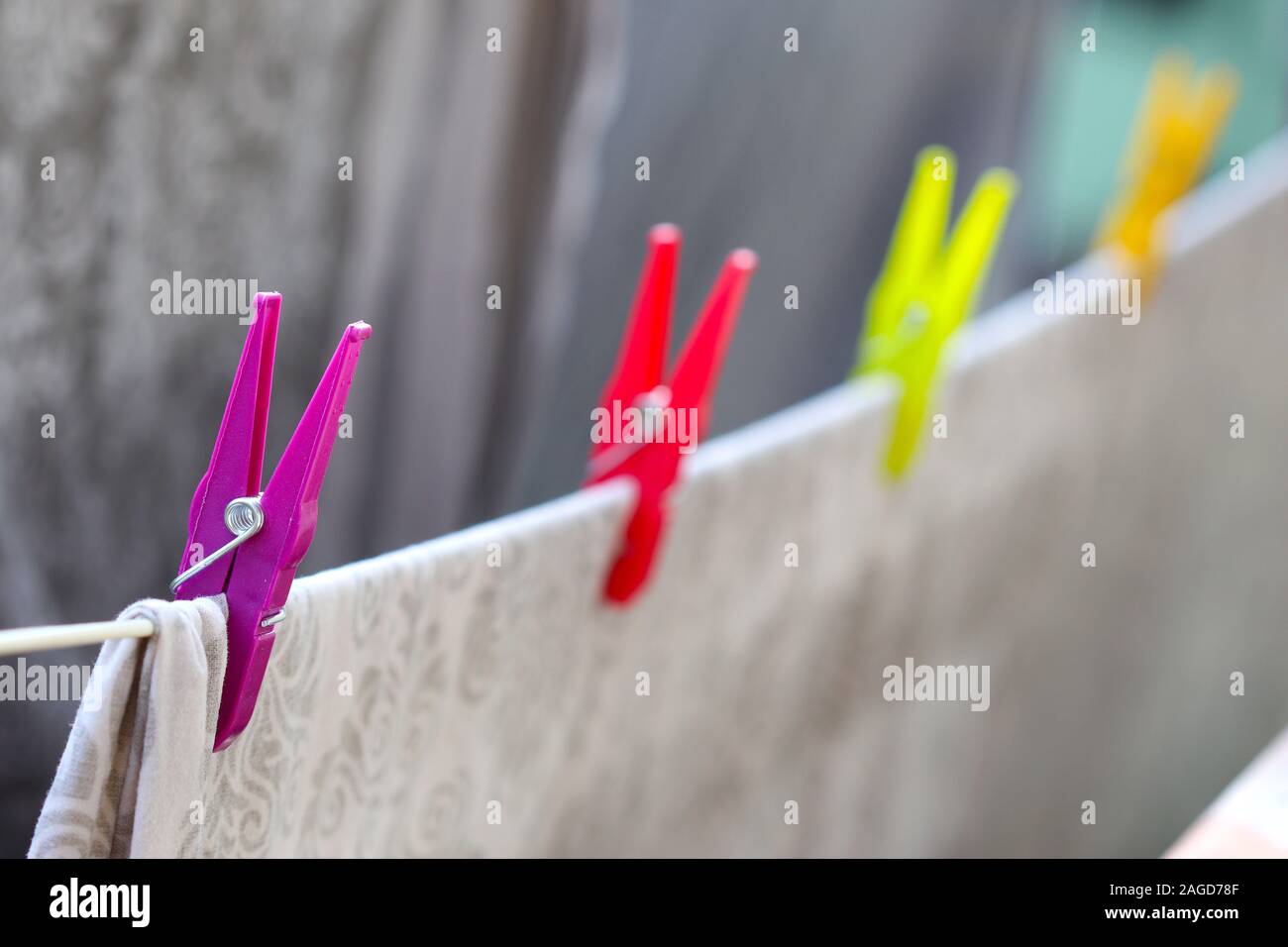 Yellow laundry peg hi-res stock photography and images - Alamy