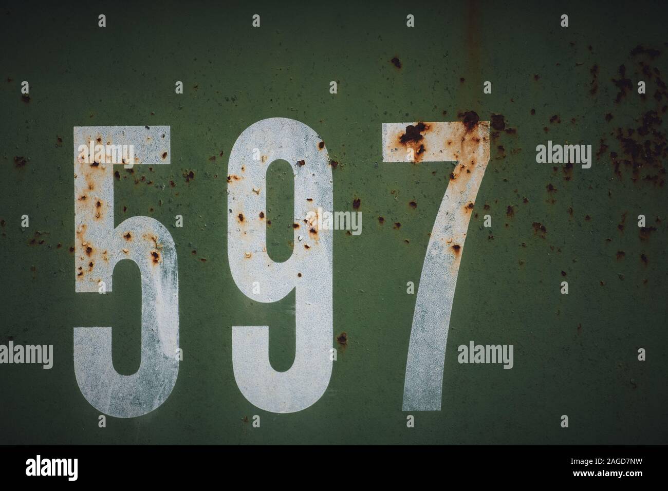 Cool closeup look of white numbers on a rusty old green metal - a good ...
