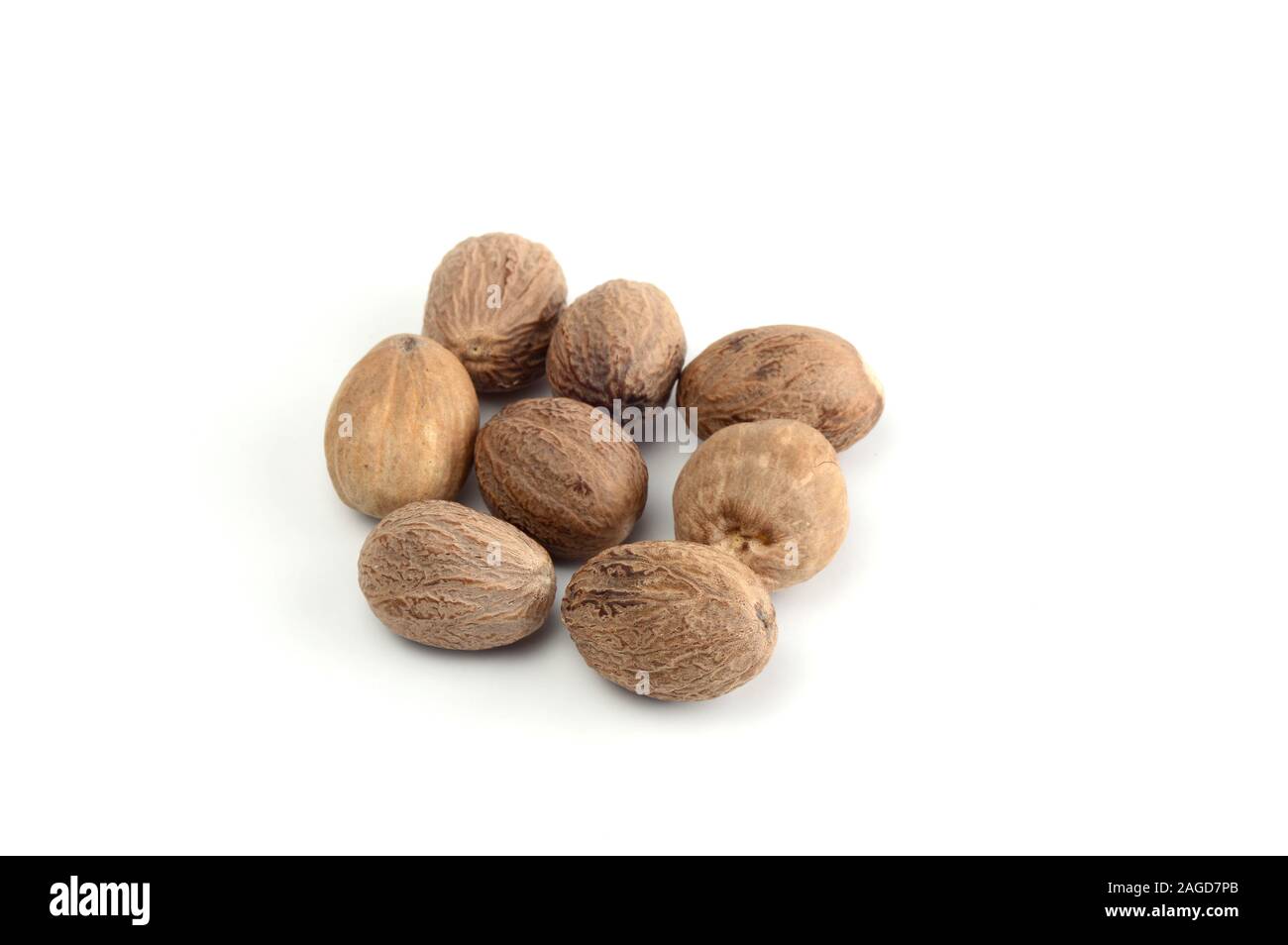 Nutmeg isolated on white background. Close up Stock Photo - Alamy